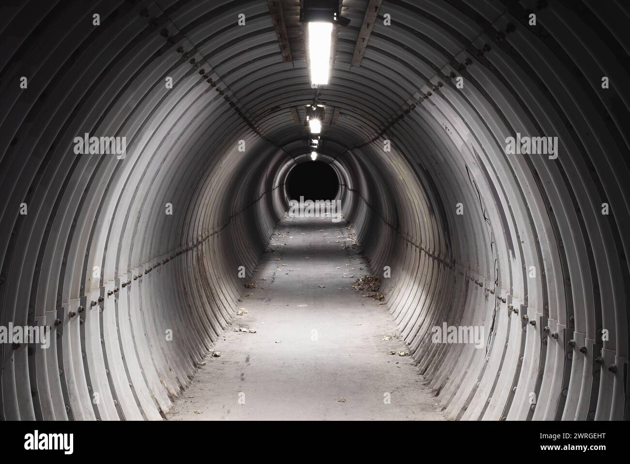 Pedestrian sidewalk tunnel at night Stock Photo - Alamy
