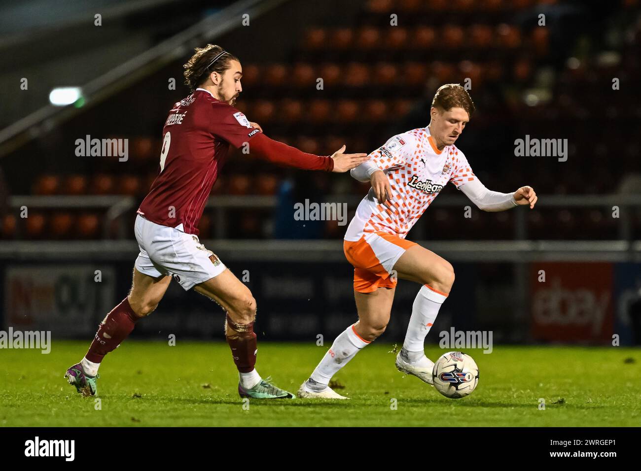 George Byers of Blackpool breaks past Louis Appéré of Northampton ...