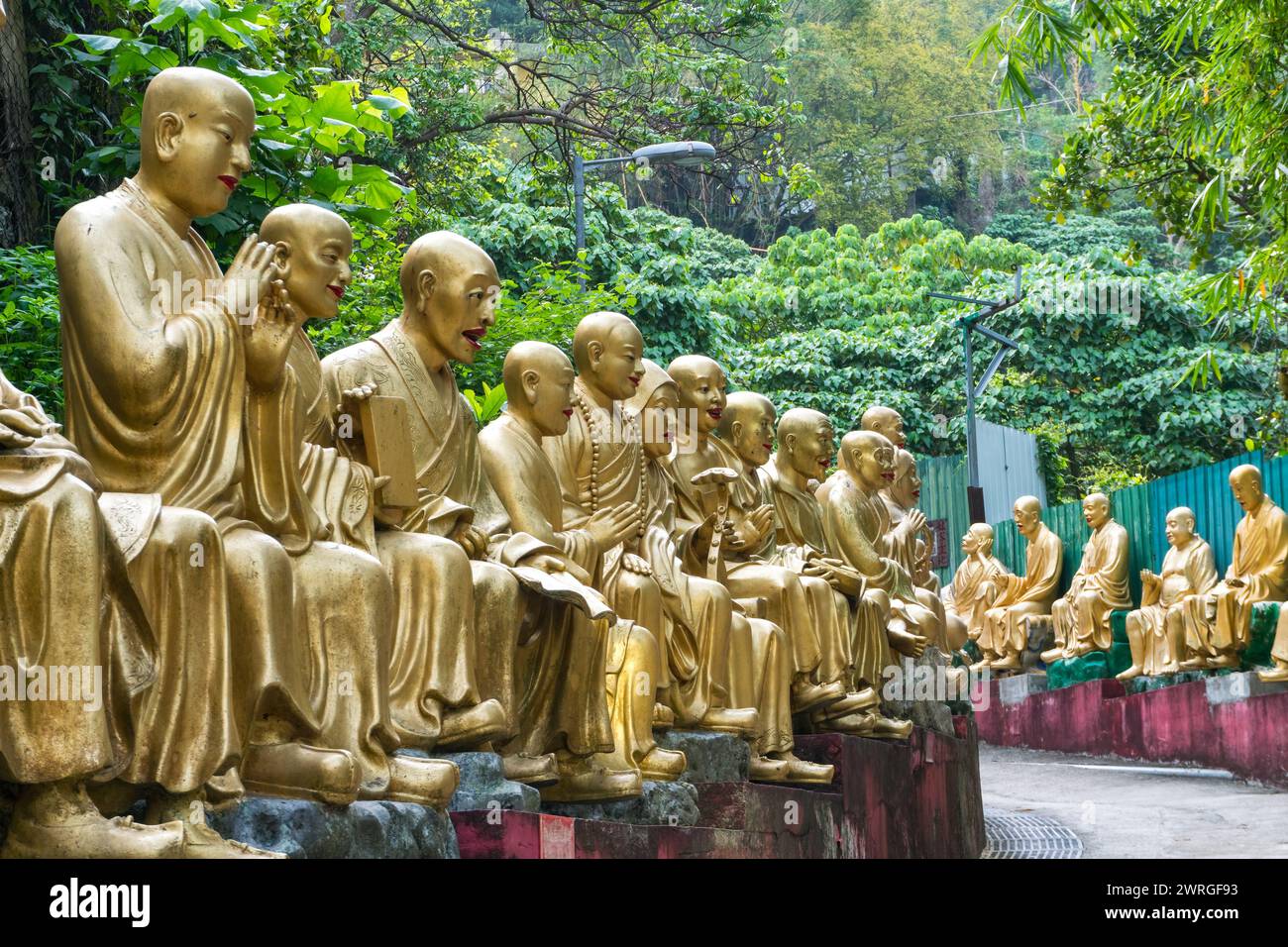 Hong Kong,March 27, 2019:The long and steep staircase with Buddha ...
