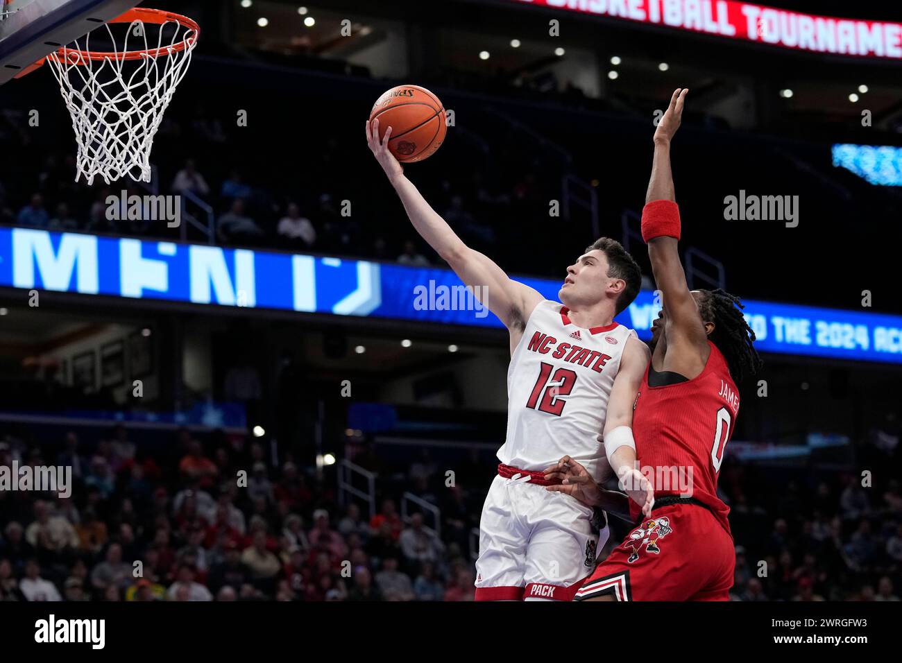 North Carolina State guard Michael O'Connell (12) driving to the basket ...
