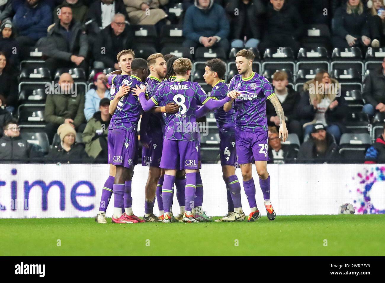 Derby, UK. 12th Mar, 2024. Reading FC squad celebrate Reading FC ...