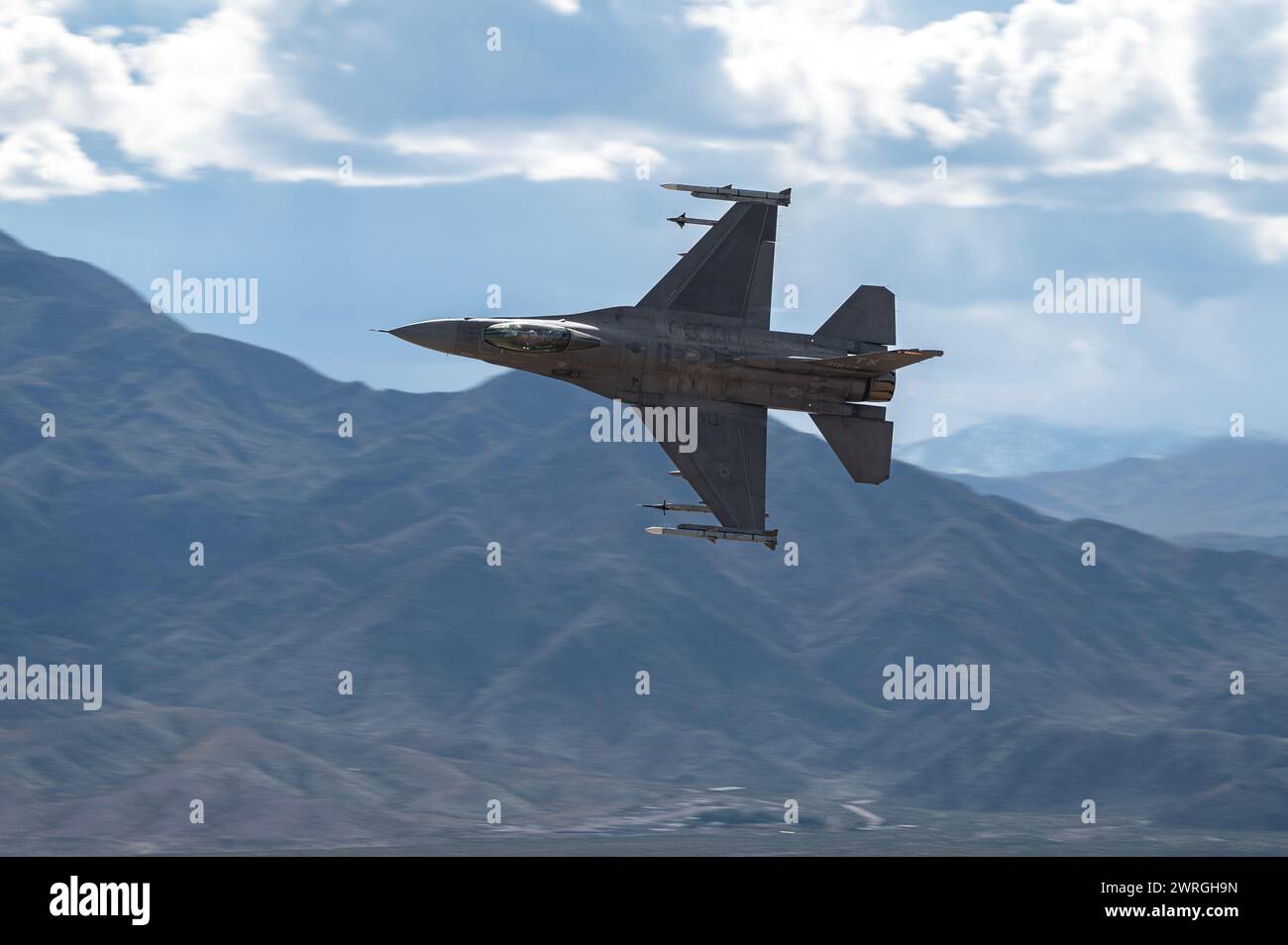 An F-16C Fighting Falcon assigned to the 706th Aggressor Squadron ...