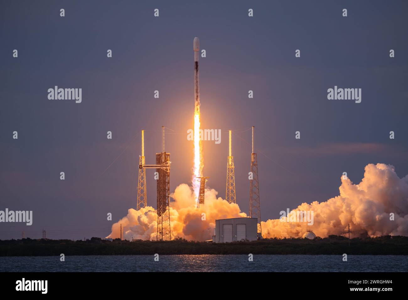 A Falcon 9 rocket carrying 23 Starlink satellites launches from Space ...