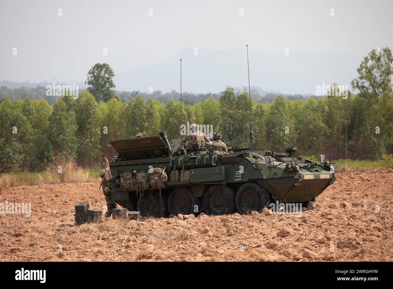 U.S. Army soldiers assigned to 2-2 Stryker Brigade Combat Team await ...