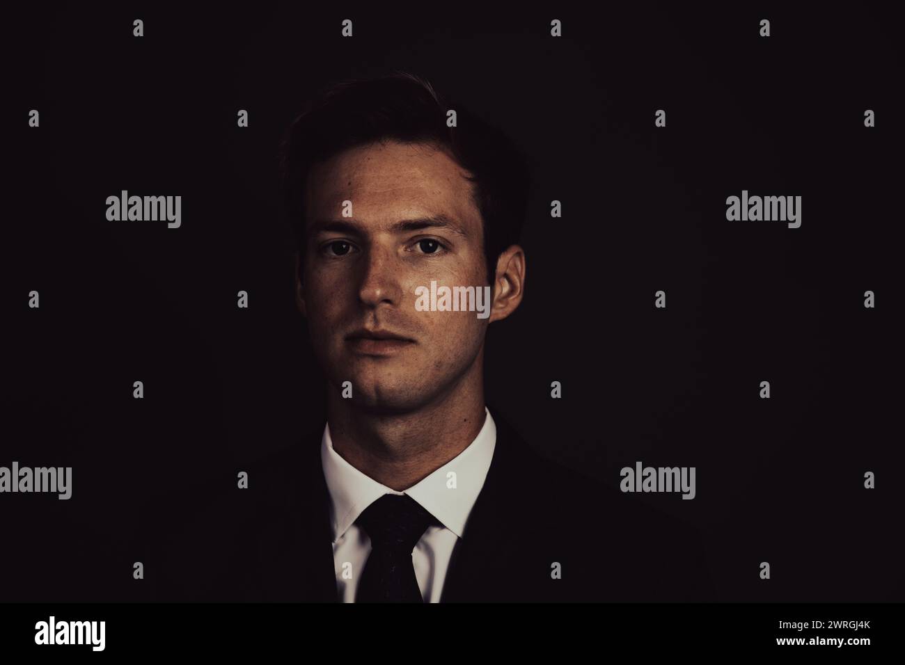 Serious businessman looking in camera hi-res stock photography and ...