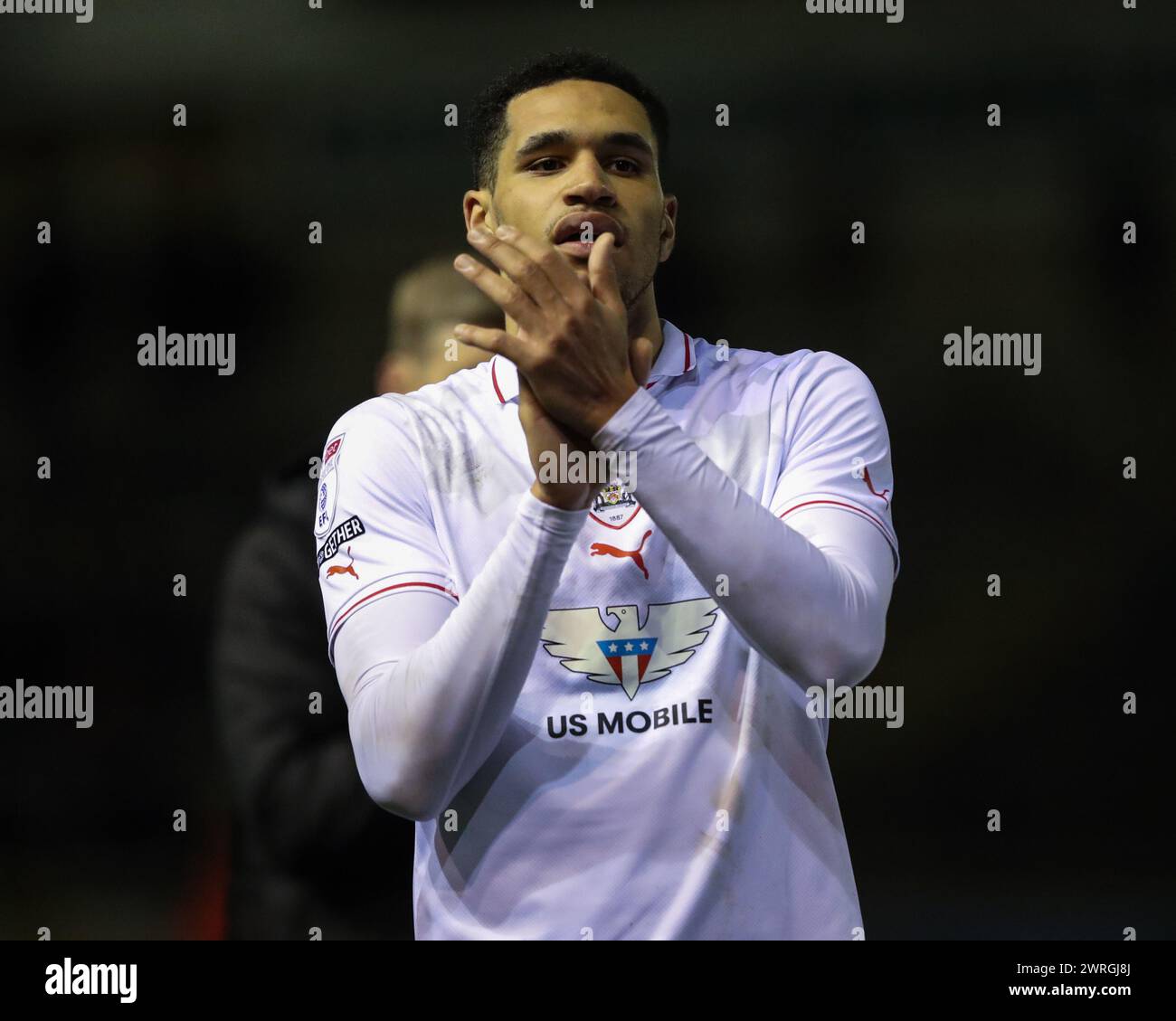 Jon Russell of Barnsley applauds the travelling fans after the game ...