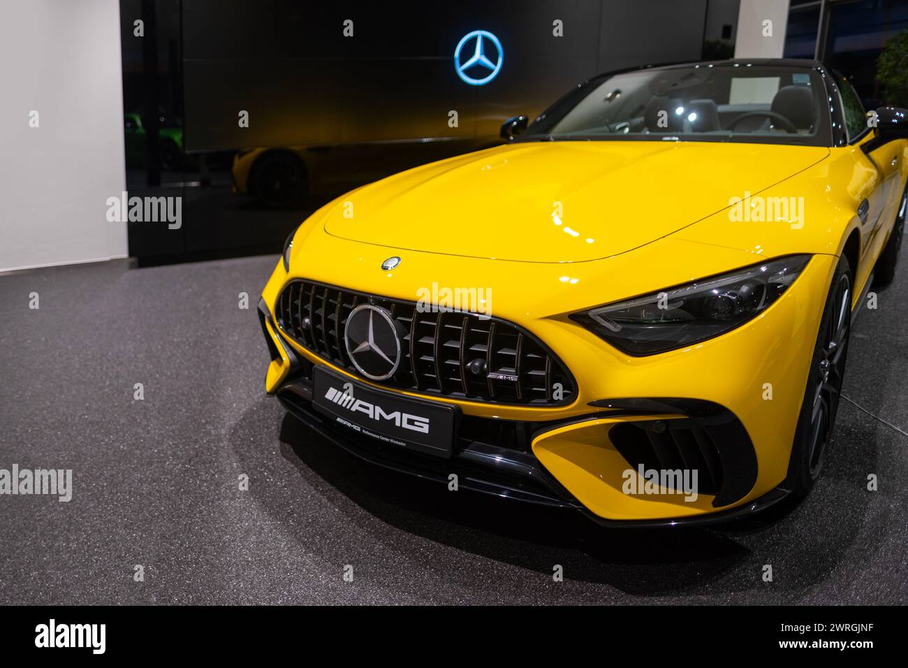 powerful yellow Mercedes-AMG SL 63 Roadster racing car parked in ...