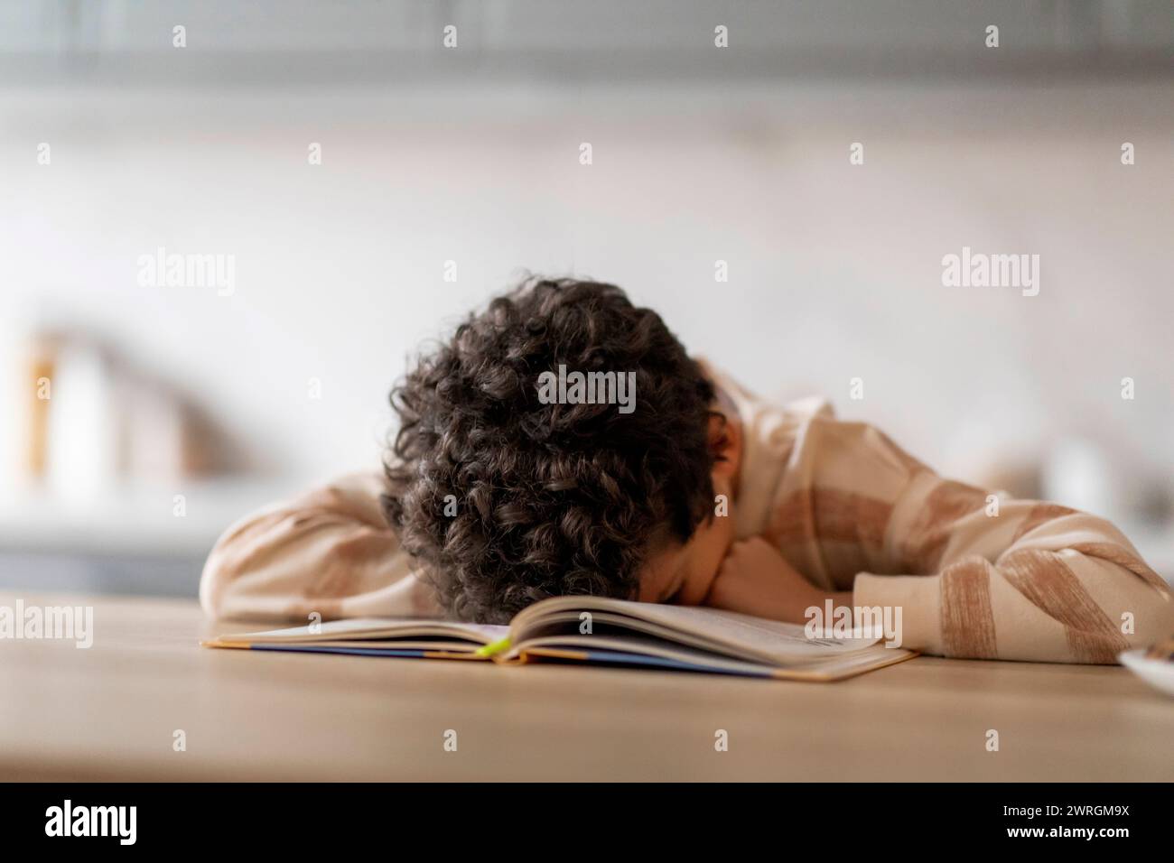 African american boy sleeping on book hi-res stock photography and ...