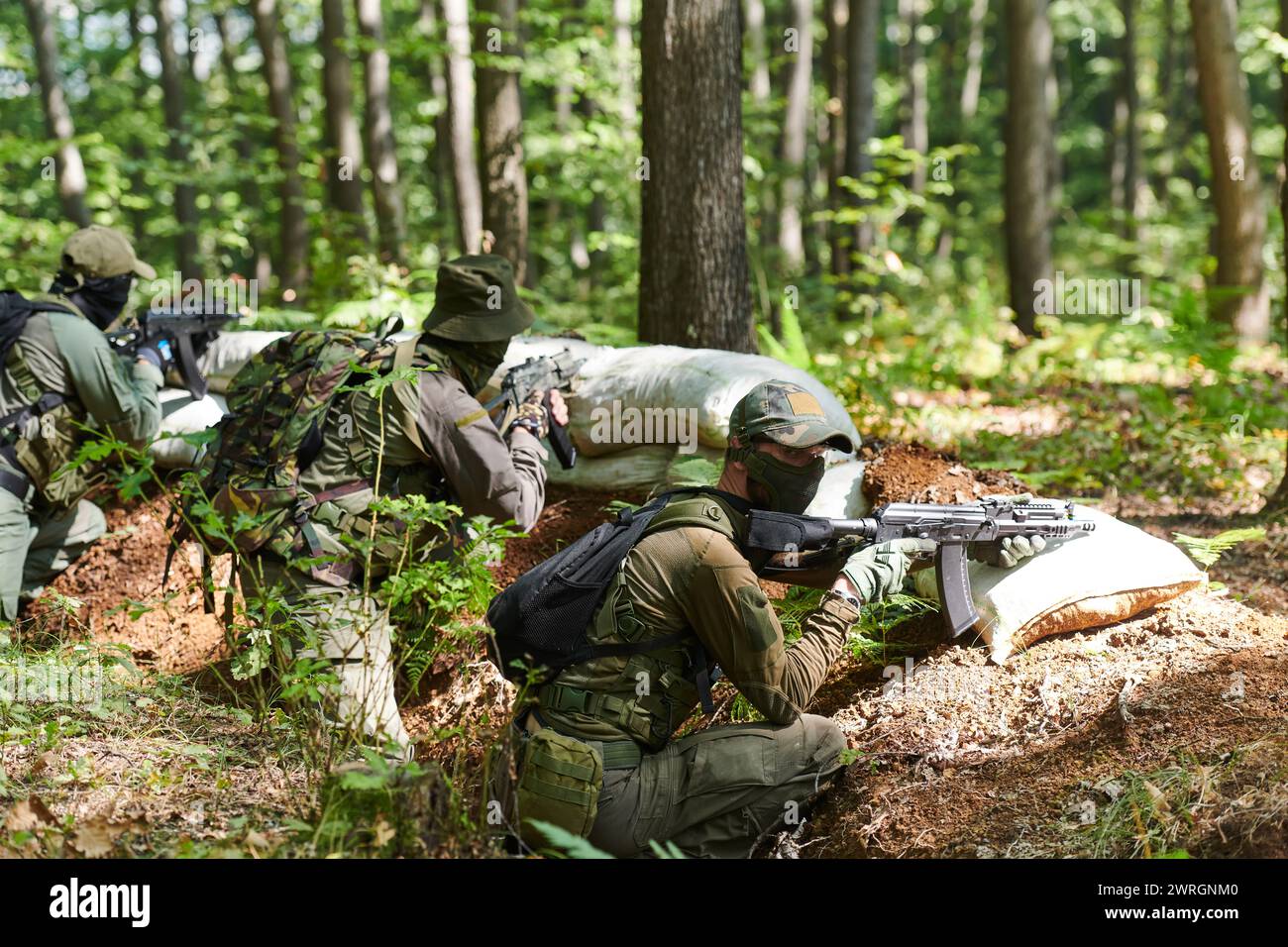 A disciplined and specialized military unit, donned in camouflage ...