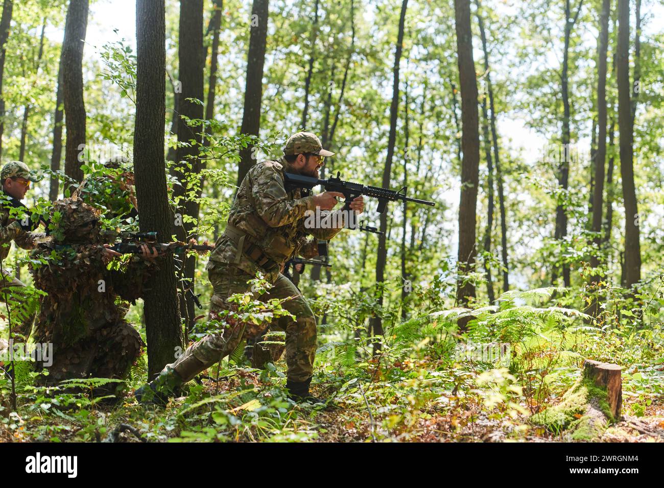 A disciplined and specialized military unit, donned in camouflage ...
