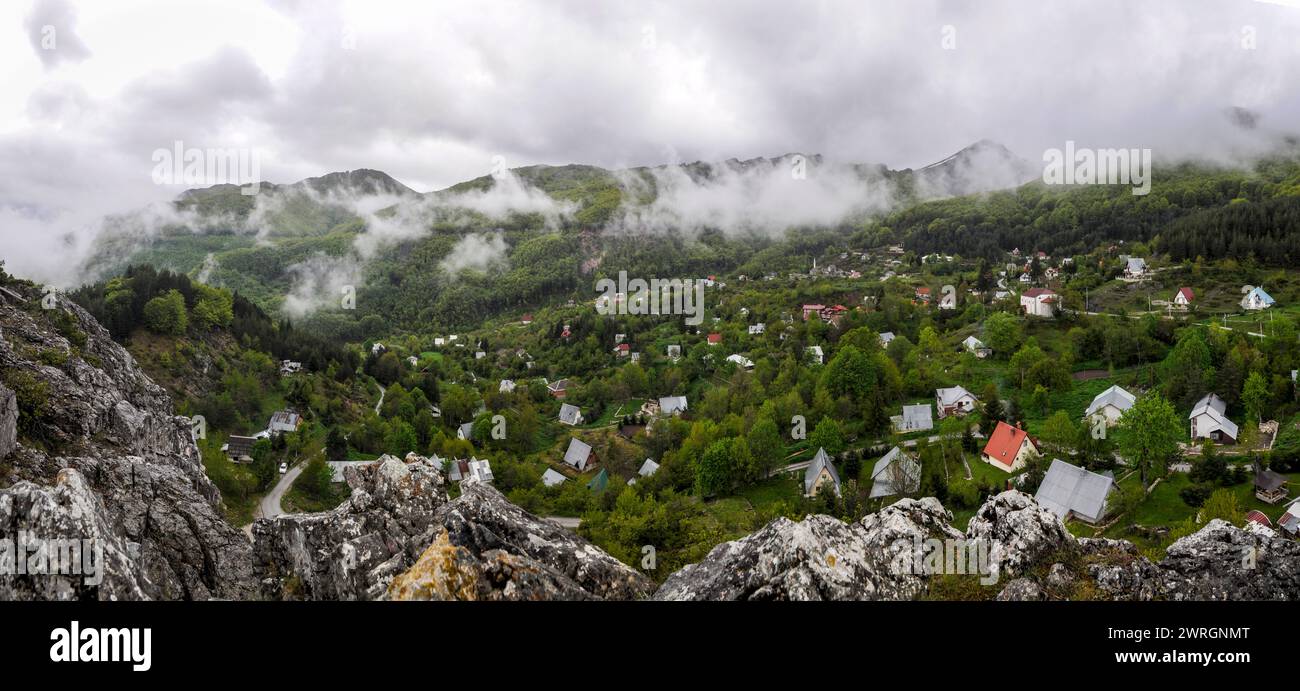 Dense forest, clouds and rain above the mountain place of Gorna Belica ...