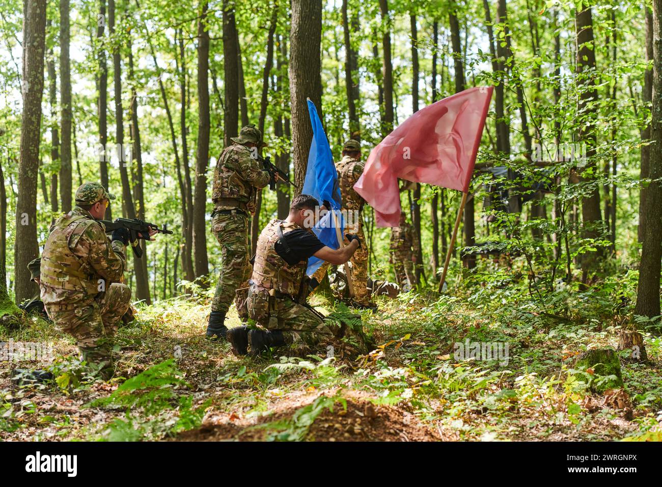 A disciplined and specialized military unit, donned in camouflage ...