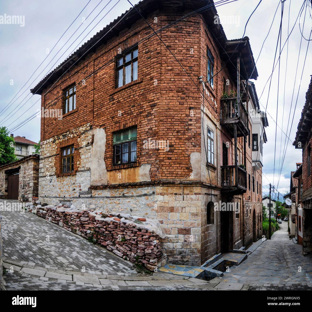 Houses with ancient architecture still in use in the mountain town of ...