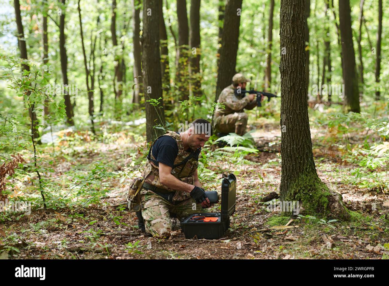 A specialized military antiterrorist unit conducts a covert operation ...