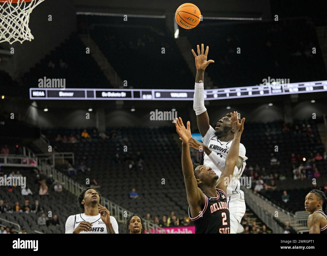 MAR 12 2024: UCF Knights forward Ibrahima Diallo (11) scores over ...