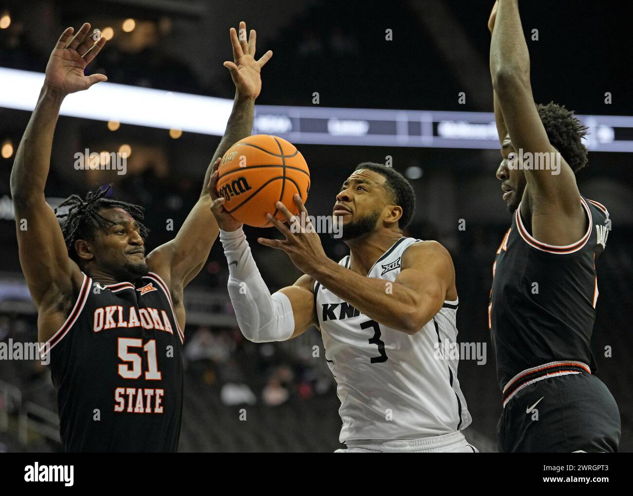 MAR 12 2024: UCF Knights guard Darius Johnson (3) drives to the basket ...