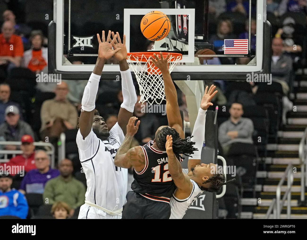 MAR 12 2024: Oklahoma State Cowboys guard Javon Small (12) drives to ...