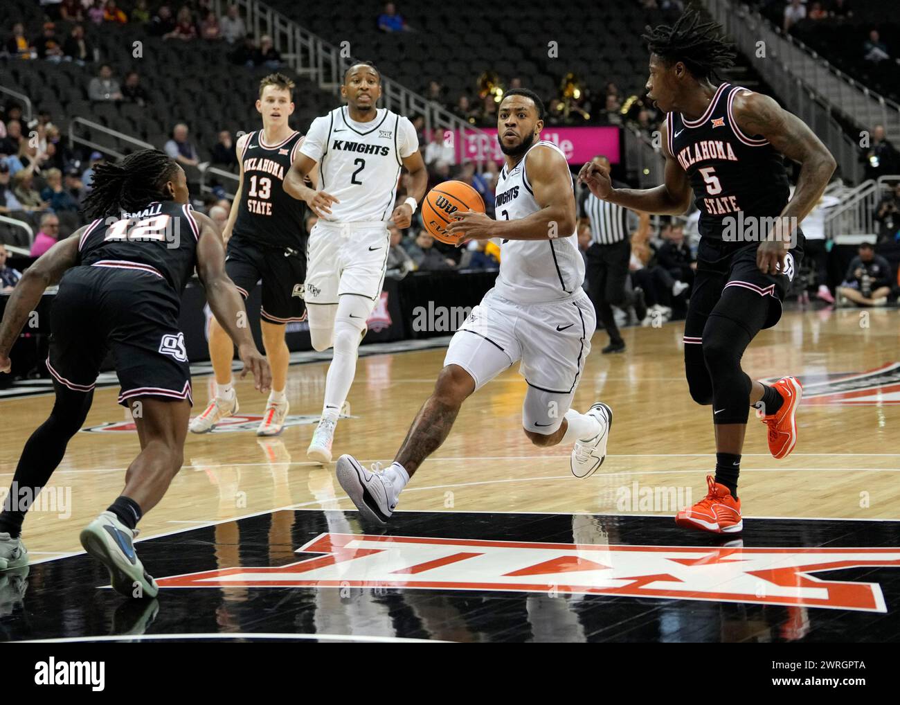 MAR 12 2024: UCF Knights guard Darius Johnson (3) drives the lane ...