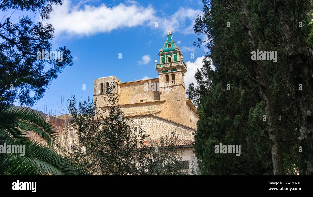 Carthusian Monastery of Valldemossa Peeking Through Verdant Trees in ...