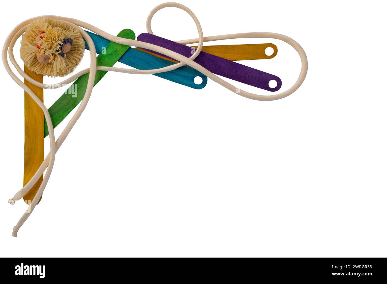 Abstract border uses colorful sticks, rope, & straw to show outline ...