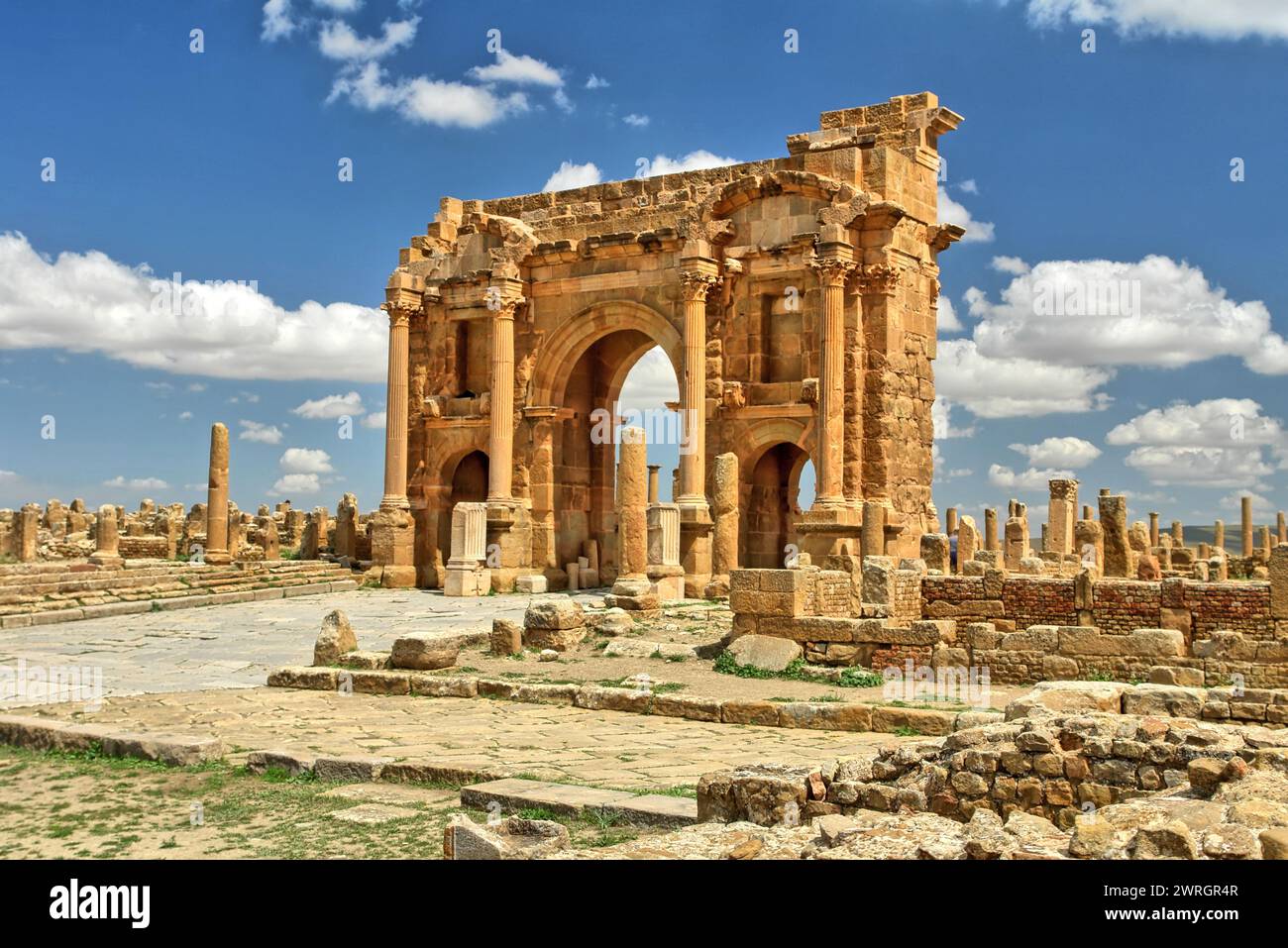Roman arch construction at the gates of the Roman city of Timgad ...
