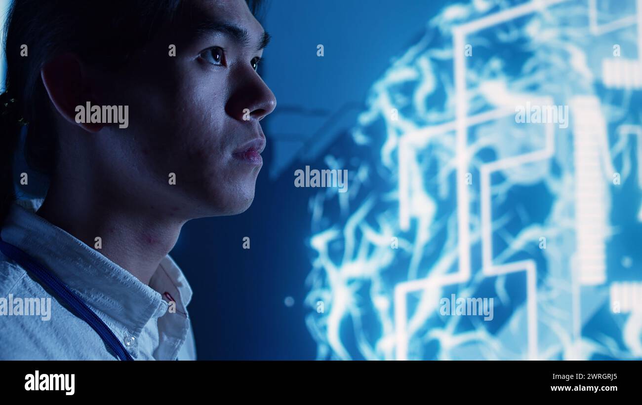 Close up of admin looking at hologram of artificial intelligence ...