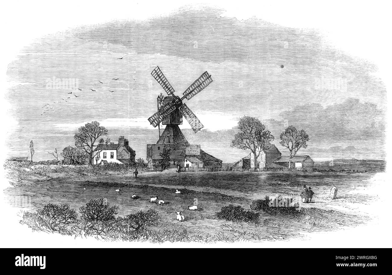 Windmill in the distance Black and White Stock Photos & Images - Alamy