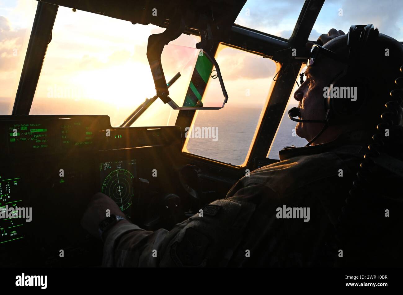 U.S. Air Force Lt. Col. Kendall Dunn, 403rd Wing pilot, flies a C-130J ...