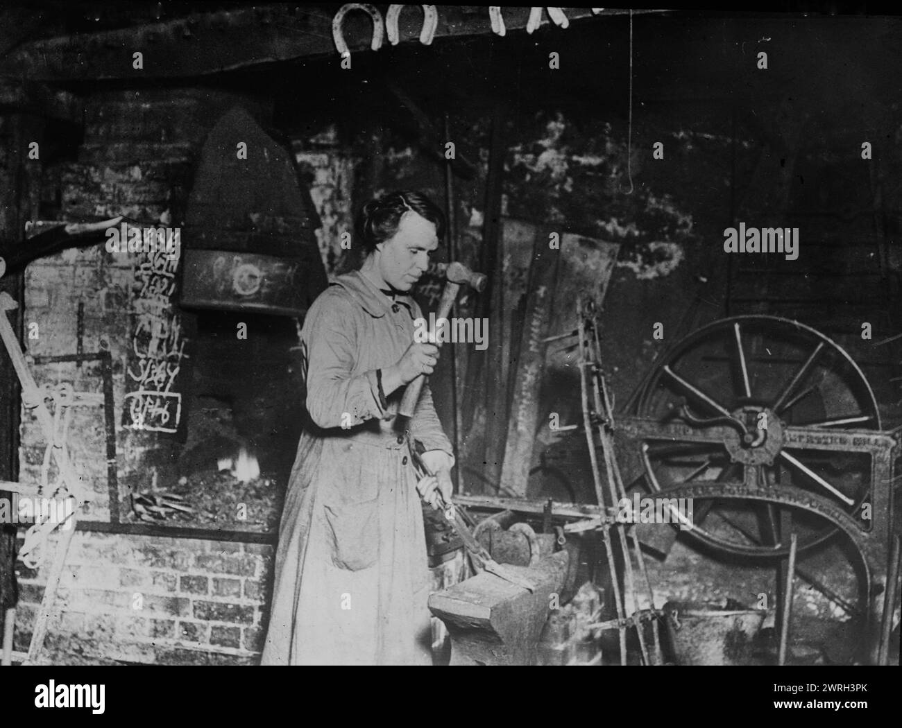 Woman blacksmith, Eng. [i.e. England], between c1915 and 1917. A woman ...
