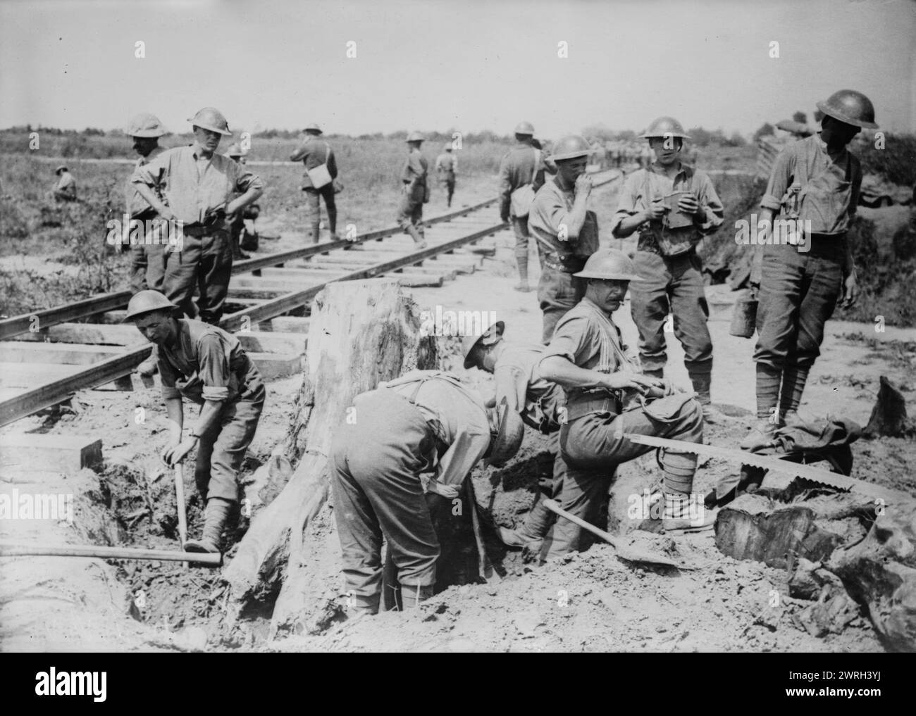 British building railroad, 28 Jul 1917. British soldiers laying a light ...
