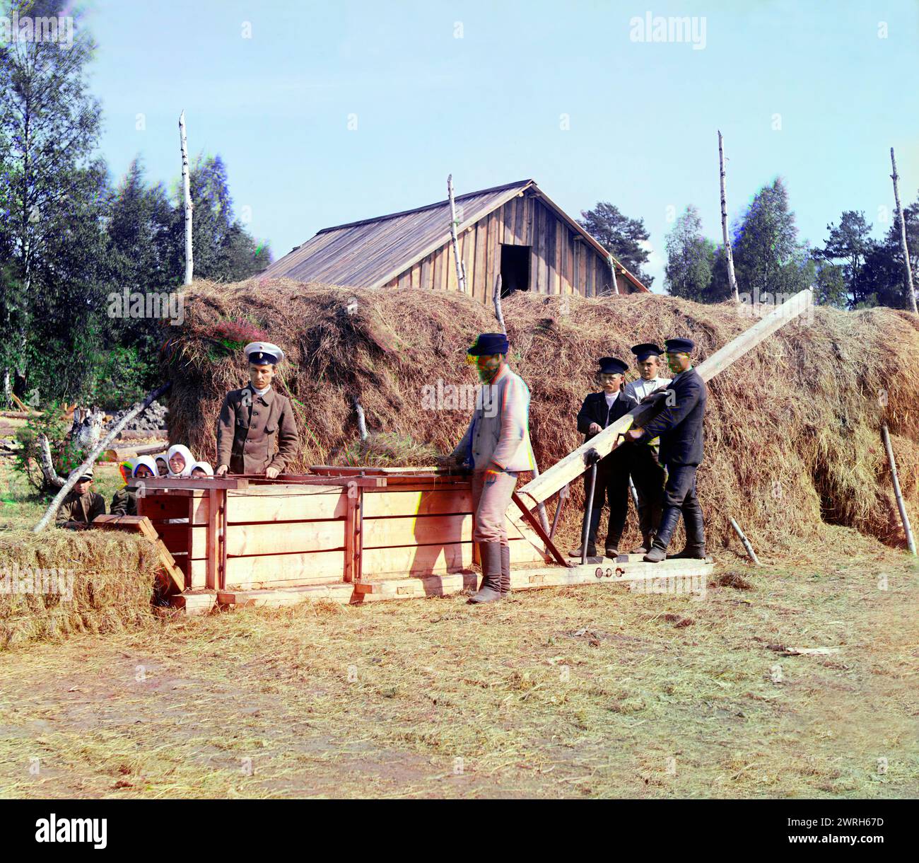 Baling machine for hay, 1915 Stock Photo - Alamy