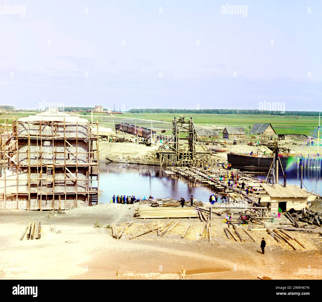 Side view of the railroad bridge being built across the Tobol River ...