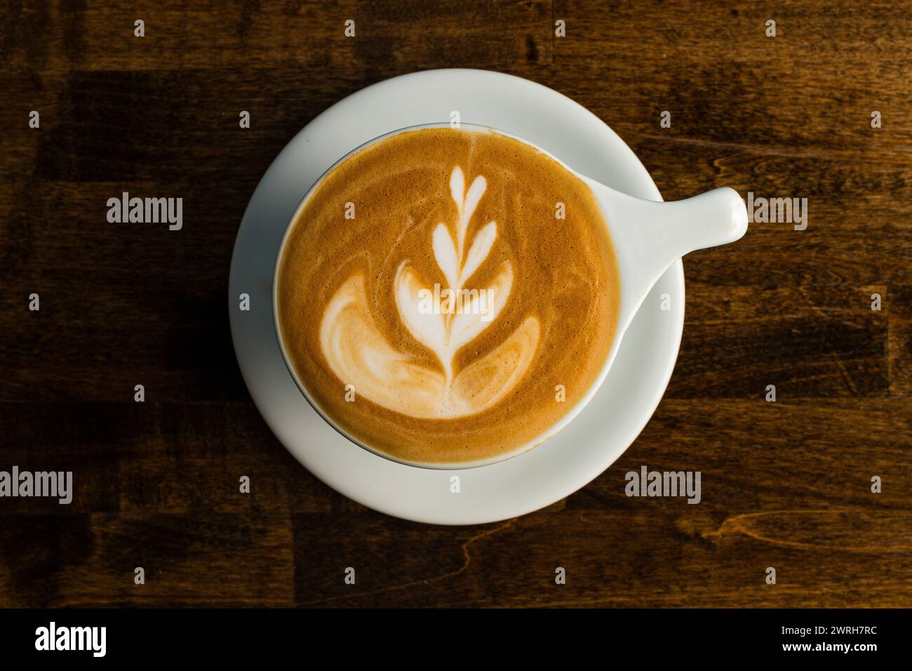 Cafe latte with latte art Stock Photo - Alamy
