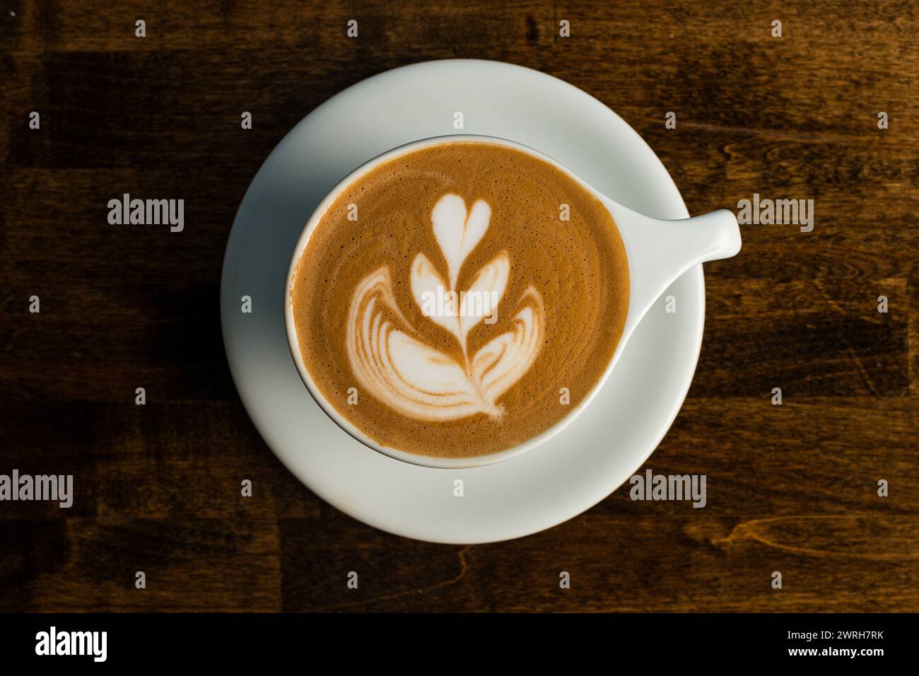 Cafe latte with latte art Stock Photo - Alamy