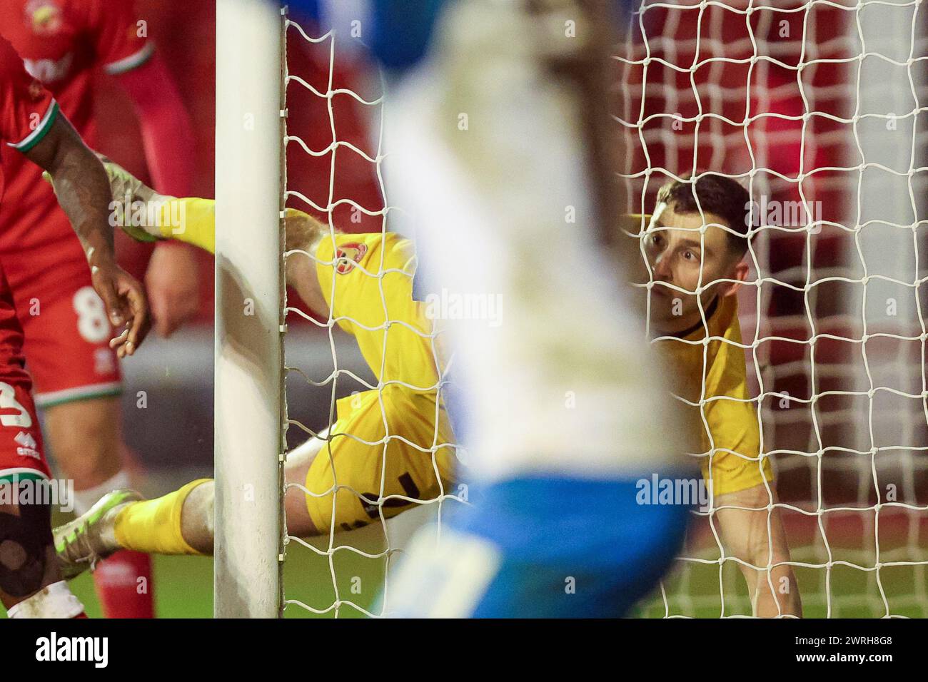 Walsall, UK. 12th Mar, 2024. Walsall's goalkeeper, Jackson Smith makes ...