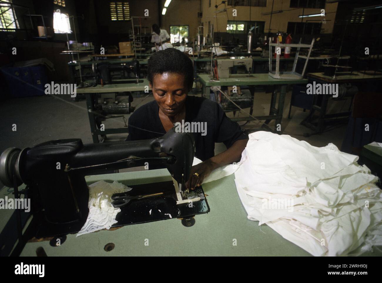 May 18, 1994;Port -au-Prince, Haiti-A factory worker toils away on her ...