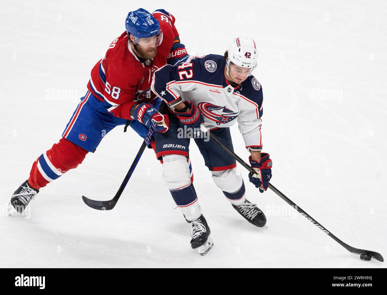 Montreal Canadiens' David Savard (58) and Columbus Blue Jackets ...