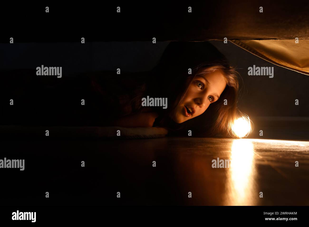 Child preteen flashlight bed hi-res stock photography and images - Alamy