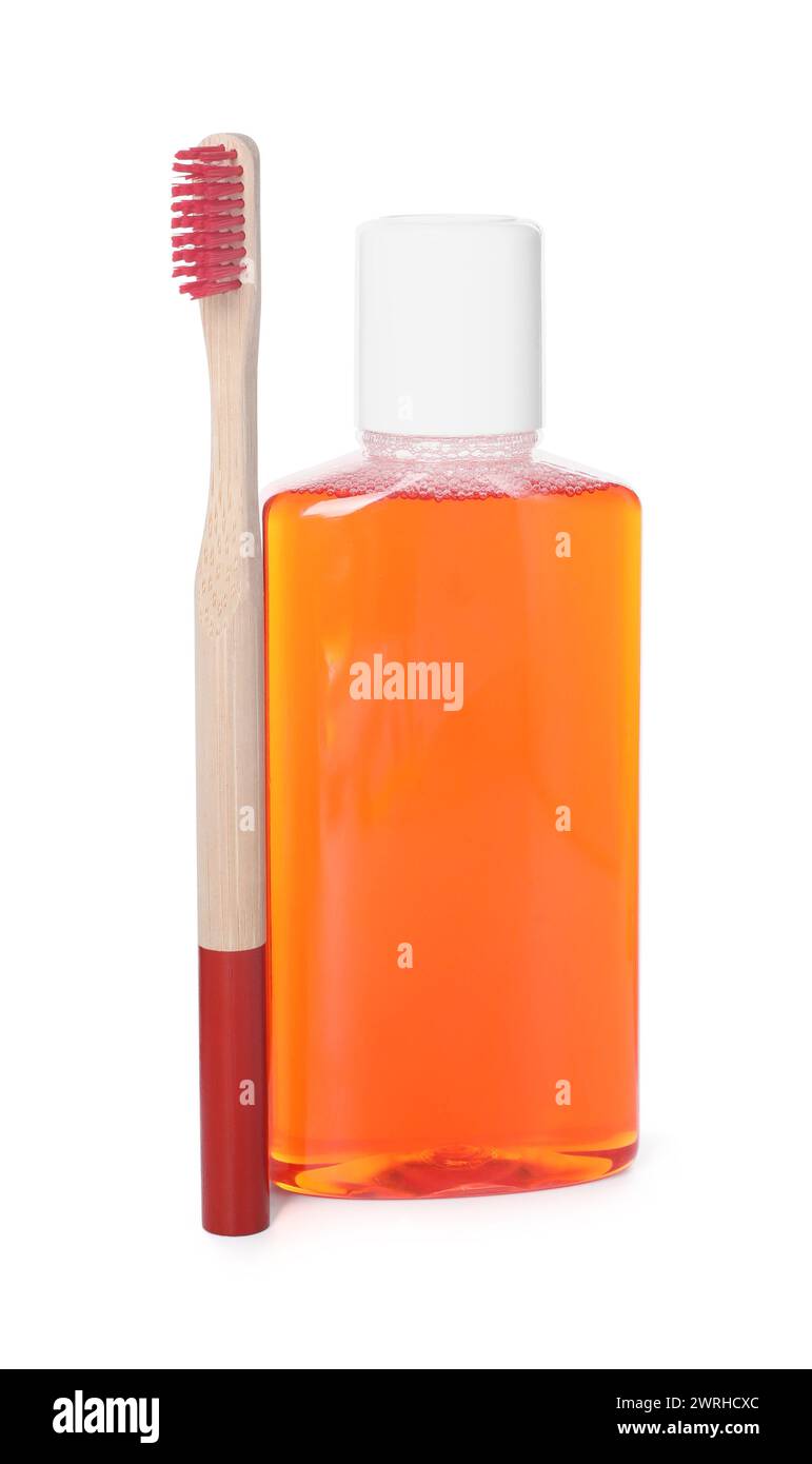 Bottle of mouthwash and toothbrush isolated on white Stock Photo - Alamy