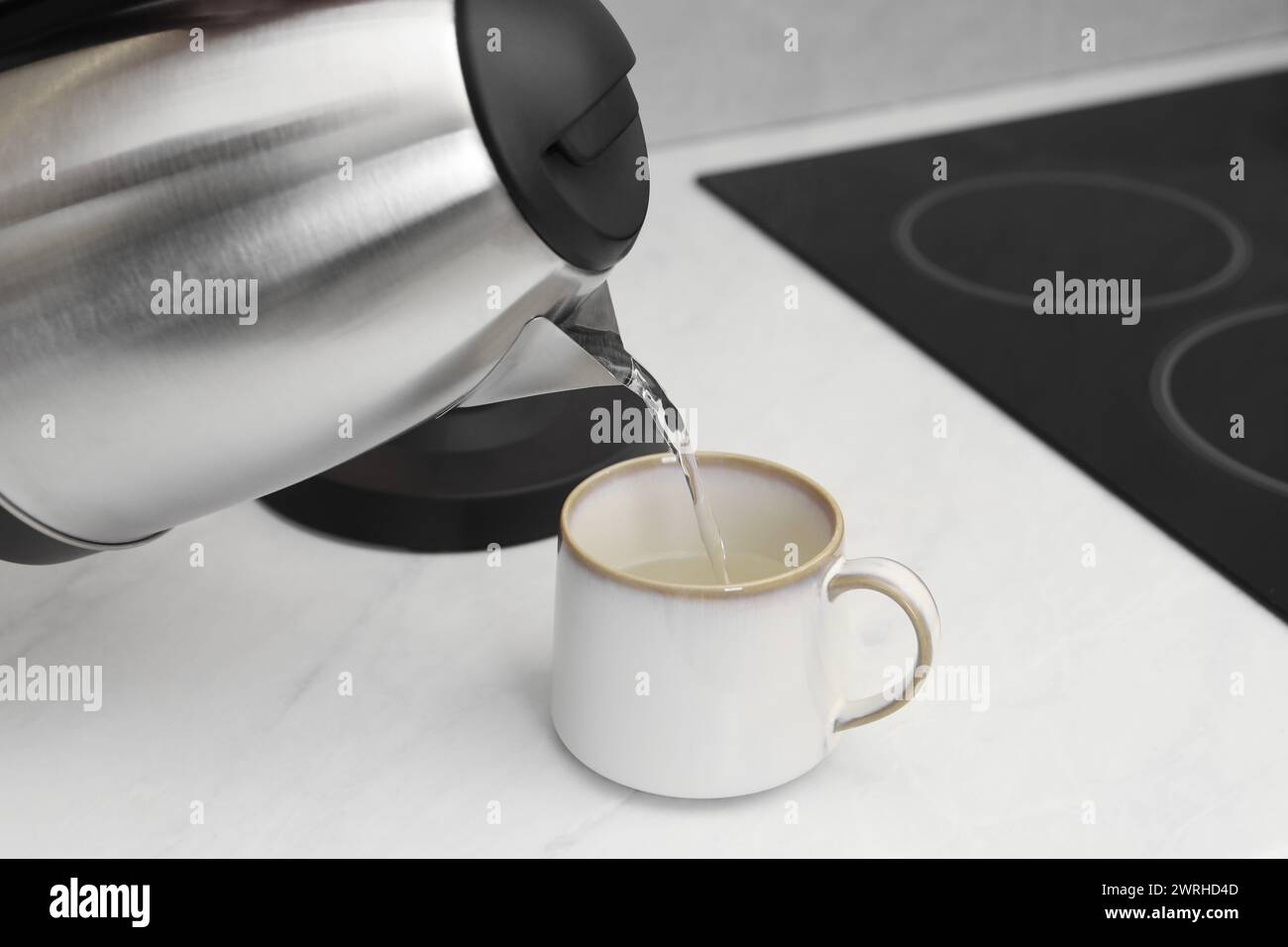 Pouring boiling water in cup hi-res stock photography and images - Alamy