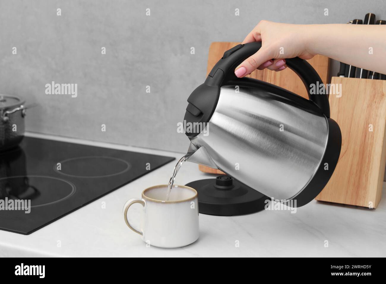 Pouring boiling water in cup hi-res stock photography and images - Alamy