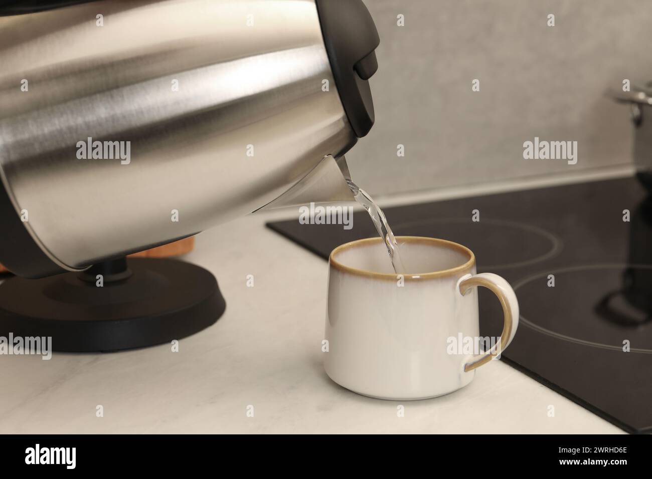 Pouring boiling water into mug hi-res stock photography and images - Alamy