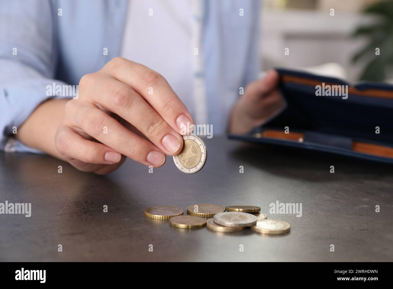 Beggar counting coins hi-res stock photography and images - Alamy