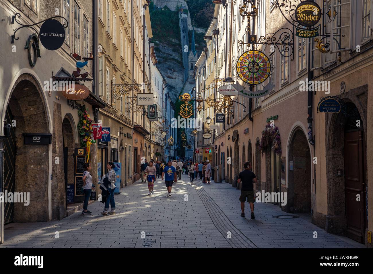 View of the Getreidegasse, a famous shopping street in the historic old ...