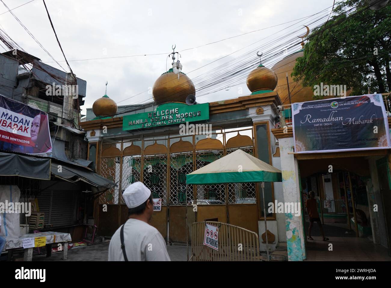 Manila, Philippines. 13th March 2024. A man entering Quiapo Golden ...