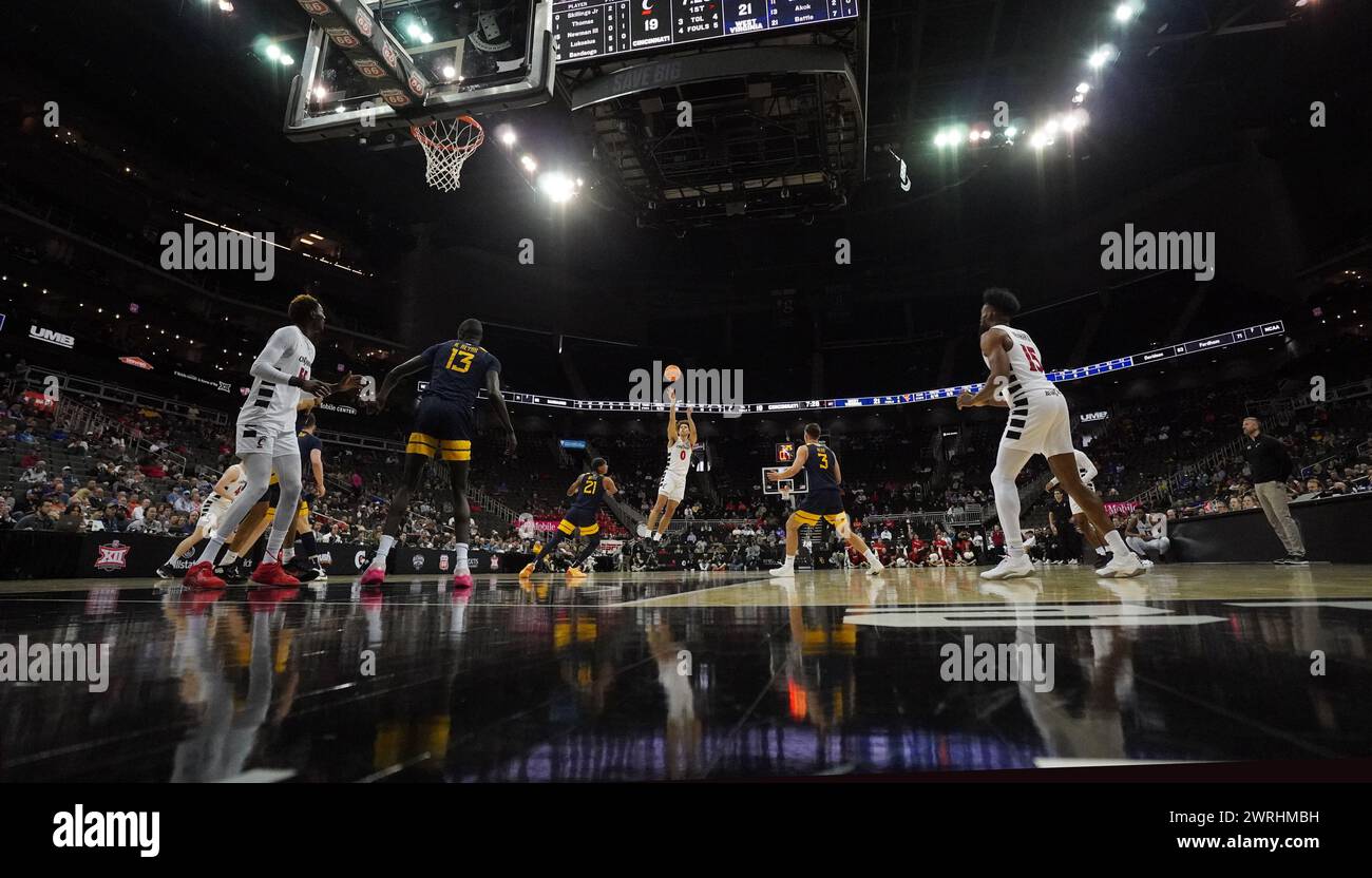 MAR 12 2024: Cincinnati Bearcats guard Dan Skillings Jr. (0) puts up a ...