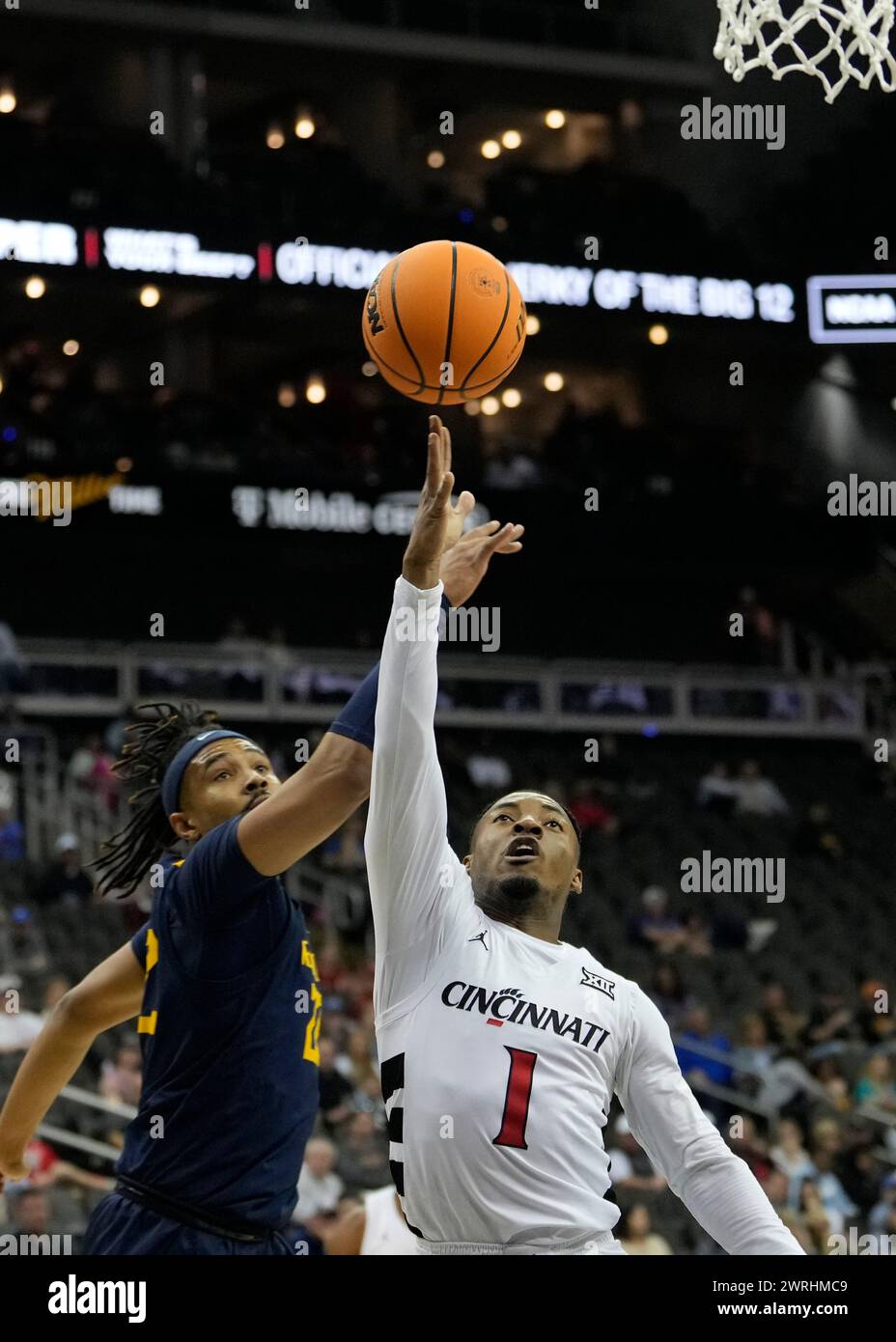 MAR 12 2024: Cincinnati Bearcats guard Day Day Thomas (1) puts up a ...