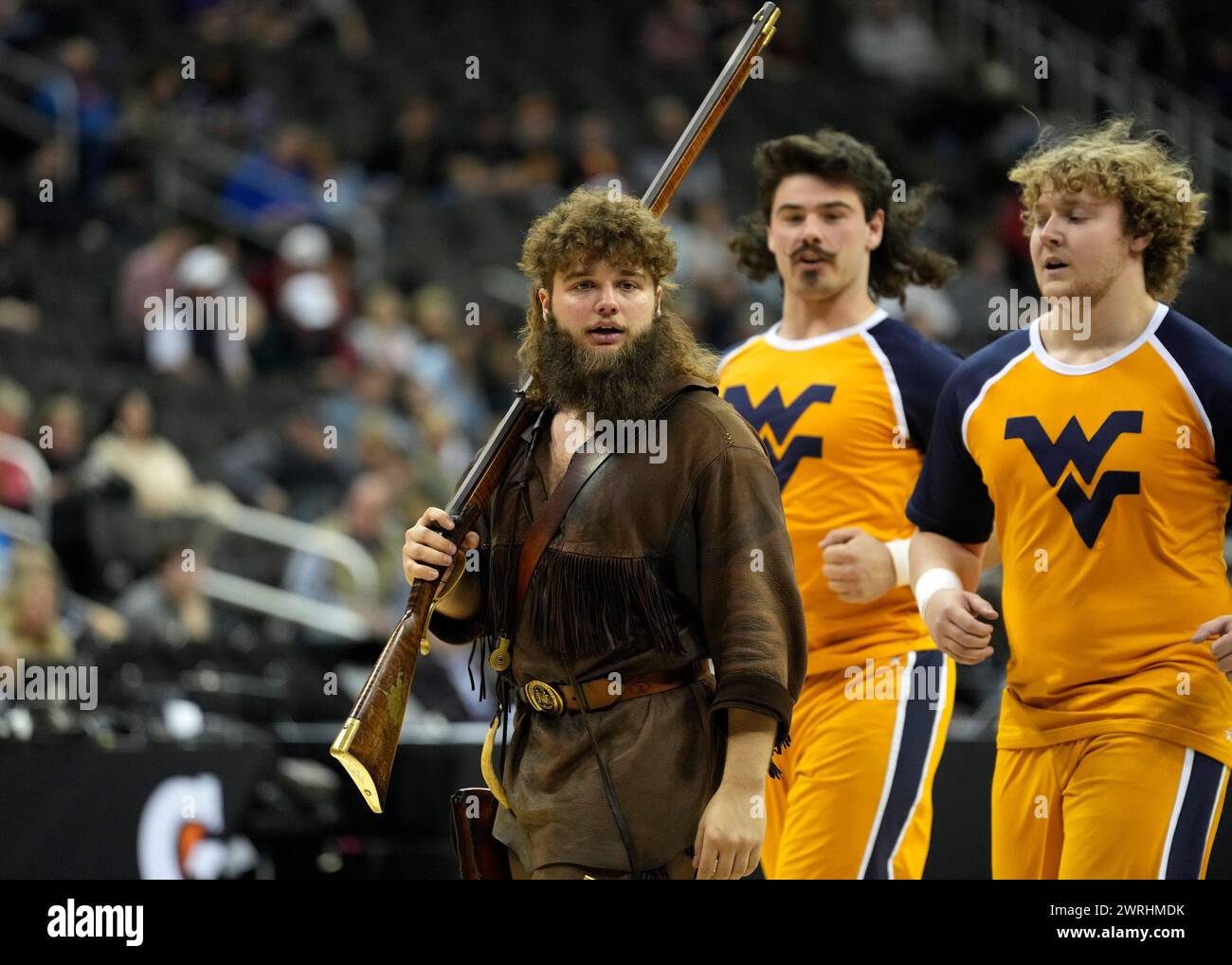 MAR 12 2024: West Virginia Mascot and spirit squad work the crowd in ...