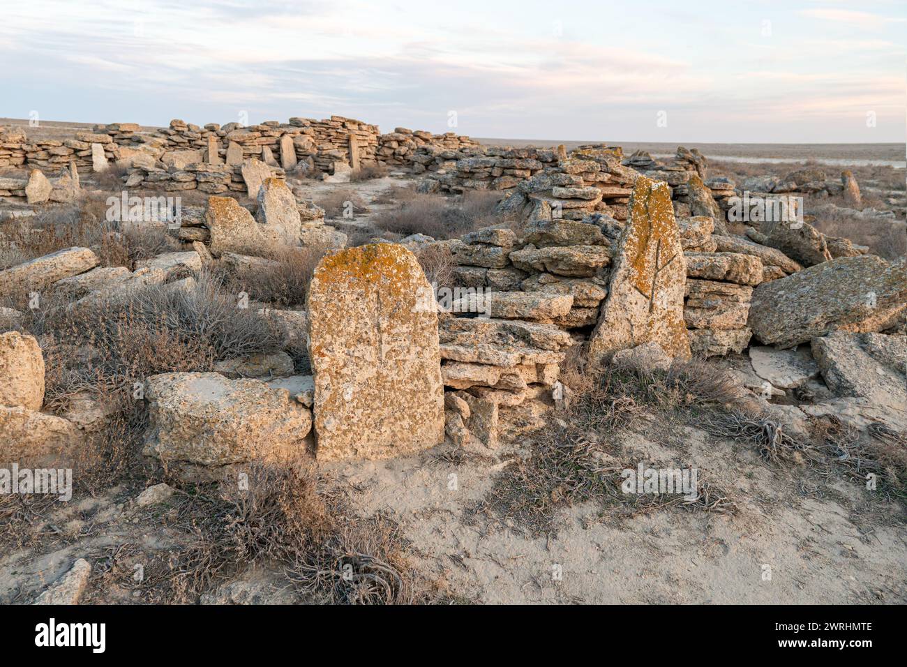 stone tombstones with symbols in the desert Stock Photo - Alamy