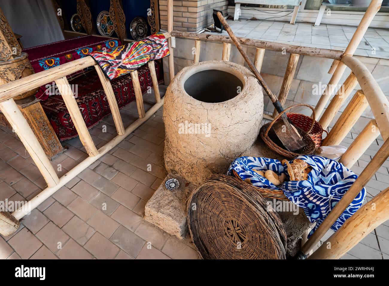 A traditional Asian clay tandoor for baking bread and tortillas ...